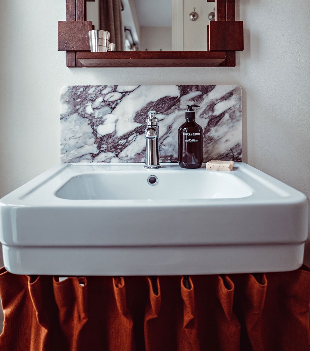 Archive Dive: 7 Wrap-Around Sink Skirts in the Bath - Remodelista